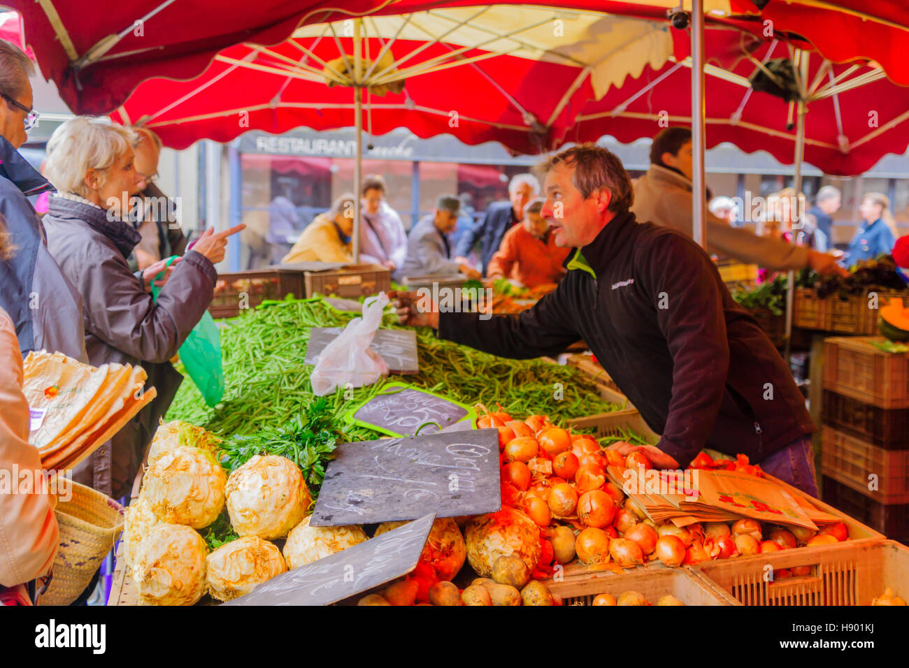 DIJON, FRANCE - OCTOBER 14, 2016: Market scene with various fruits and ...