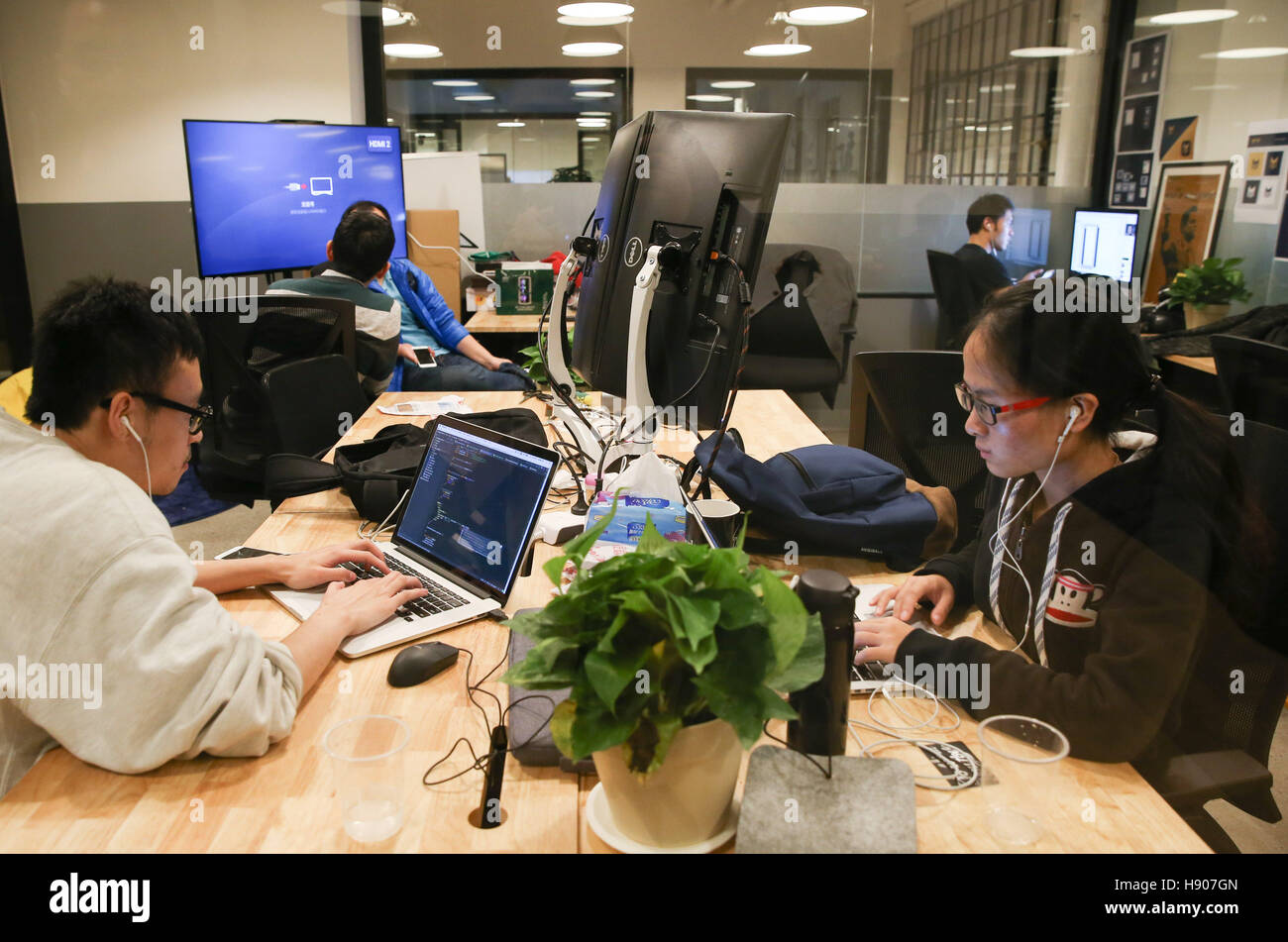Shanghai, China. 17th Nov, 2016. Startups work at WeWork branch in ...