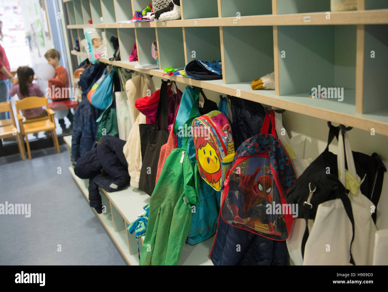 Stuttgart, Germany. 17th Nov, 2016. Backpacks hang in the coatroom in a ...