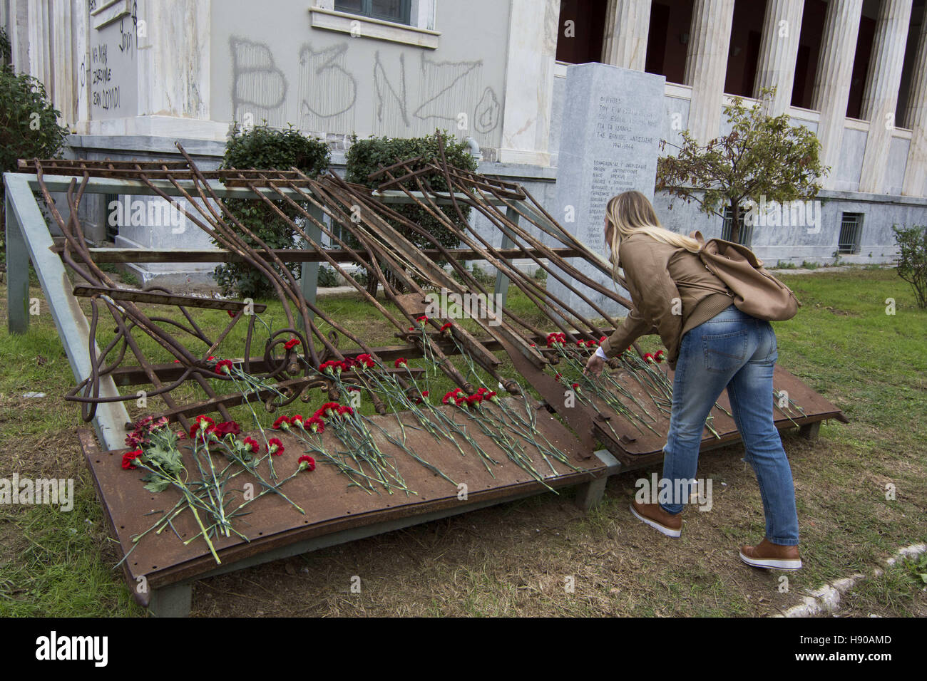 Athens, Greece. 16th Nov, 2016. People lay flowers on the Athens ...
