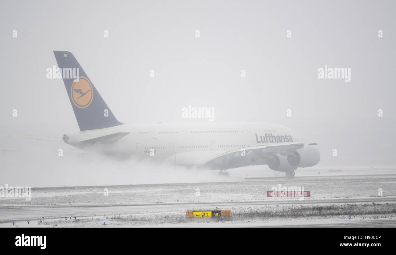 A Lufthansa Airbus A380-800 is de-iced at the airport in Frankfurt am ...