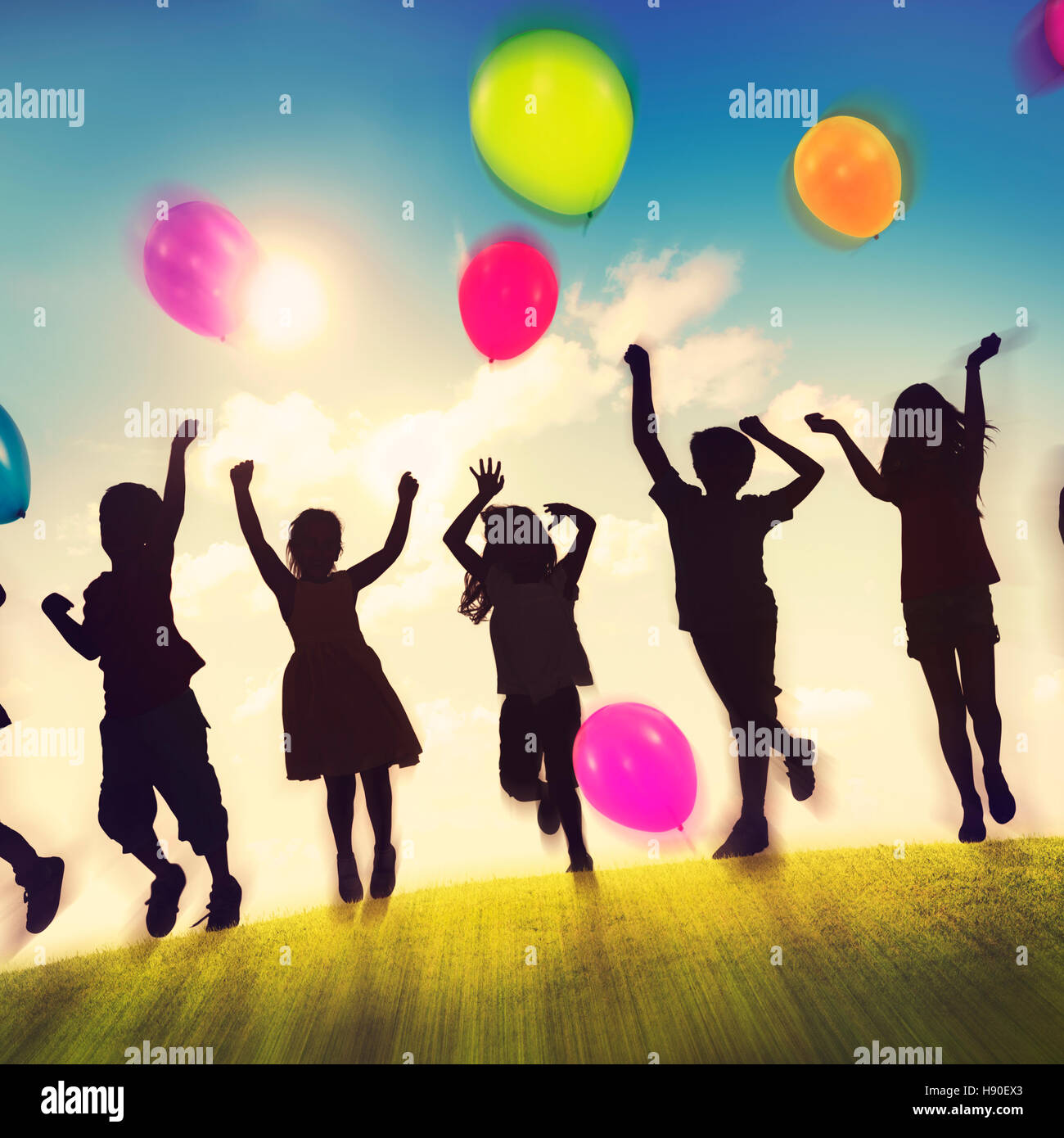 Children happy fun diverse balloons hi-res stock photography and images ...