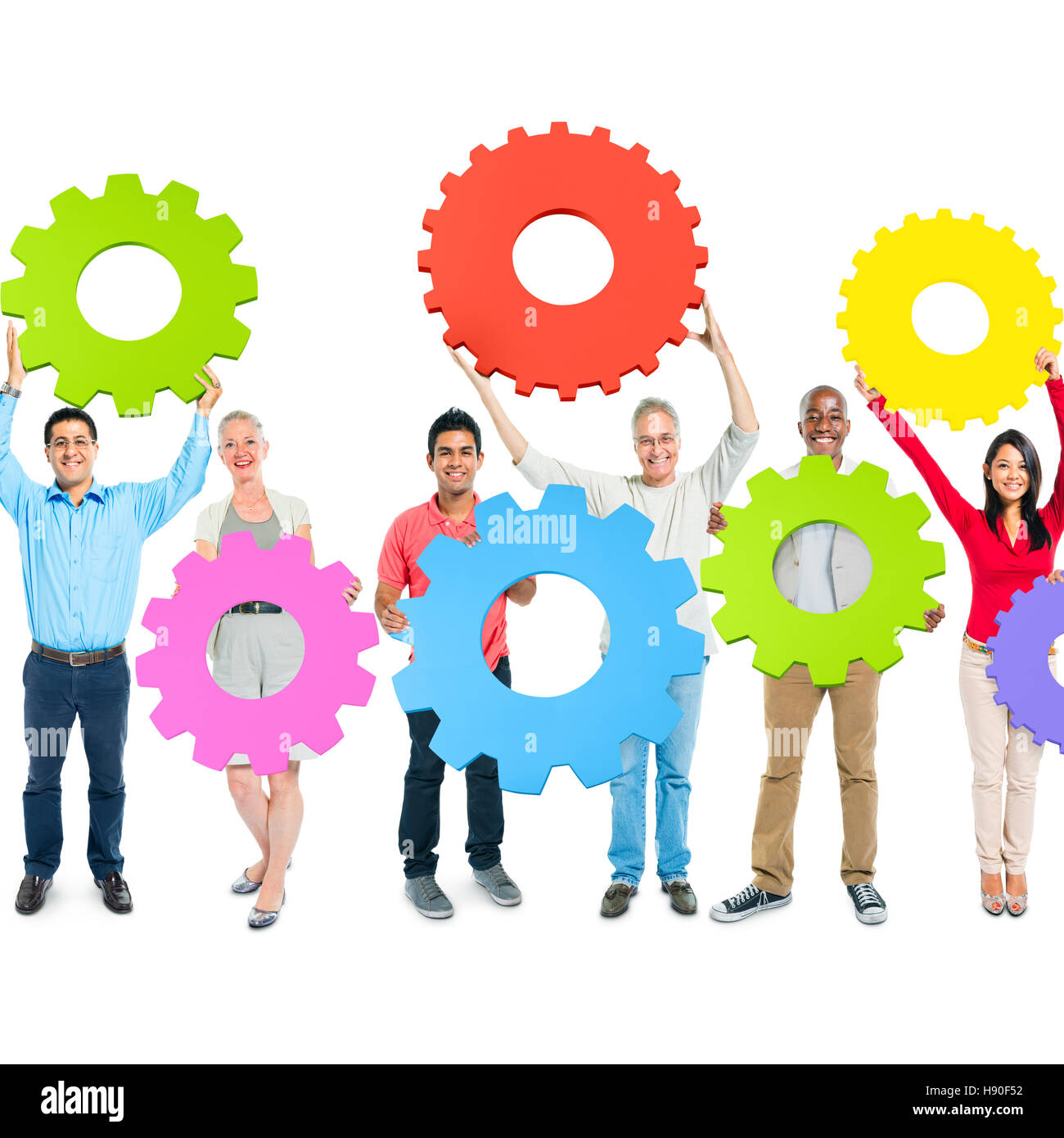 Diverse Group People Holding Gear Teamwork Concept Stock Photo - Alamy