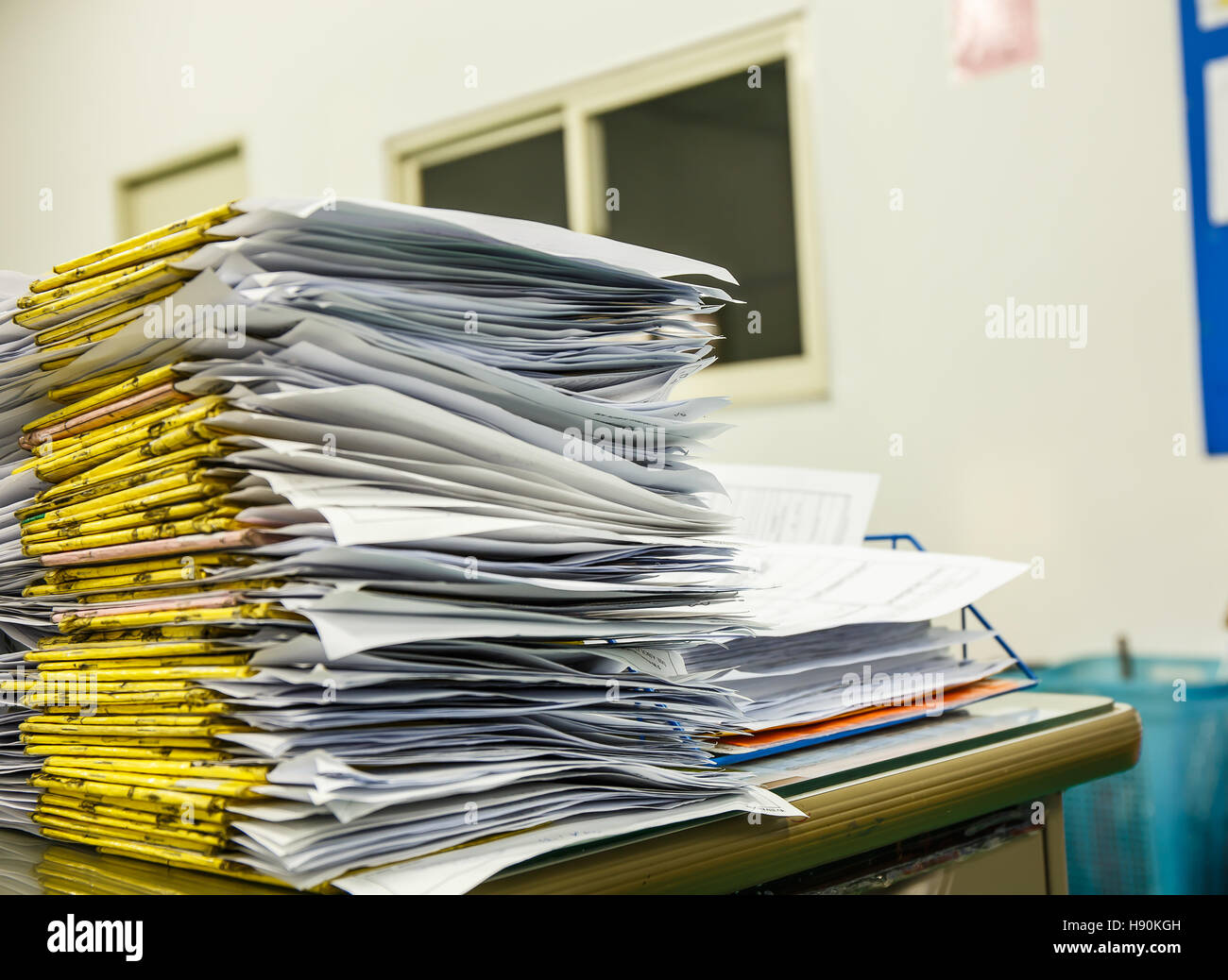 A pile of documents Desk Stock Photo - Alamy