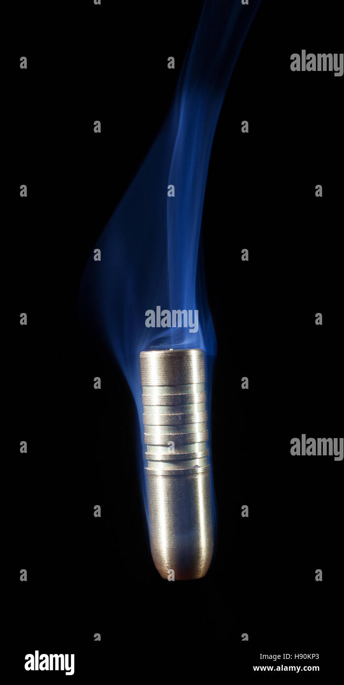 Bullet smoke behind black hi-res stock photography and images - Alamy