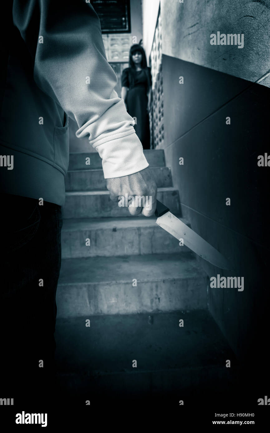 An intruder with knife in hand,Scary background for book cover ideas ...