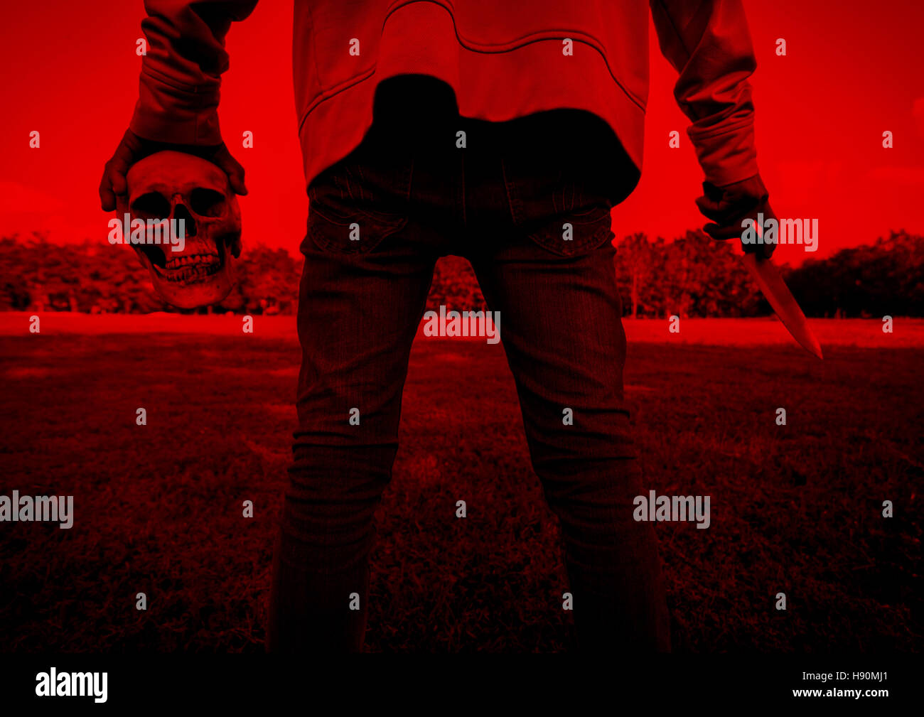 Release evil,Person with human skull in hand,Scary background for ...