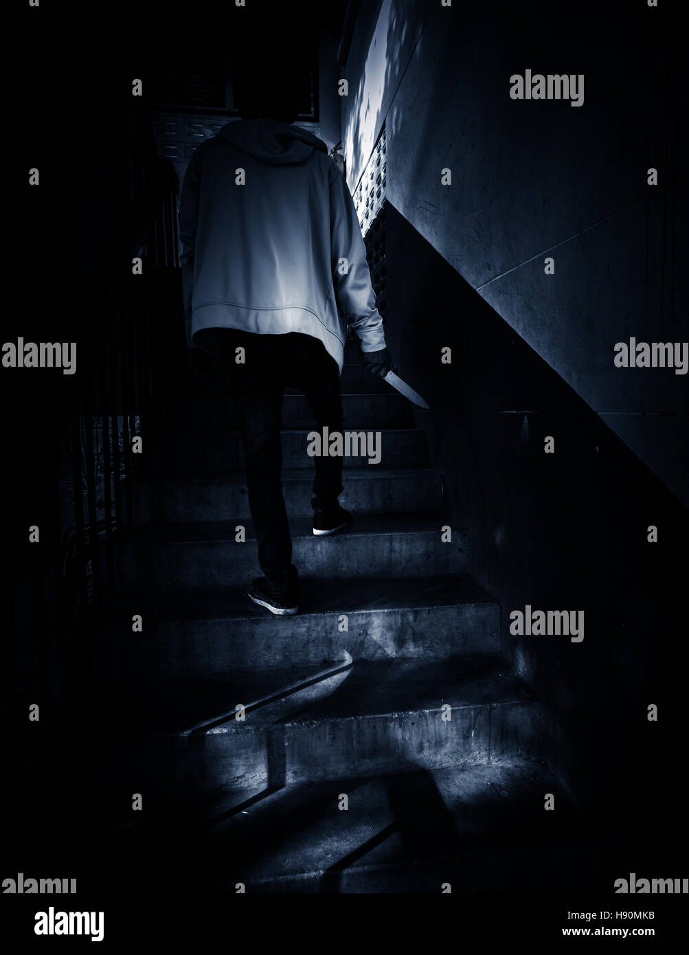 An intruder with knife in hand,Scary background for book cover ideas ...