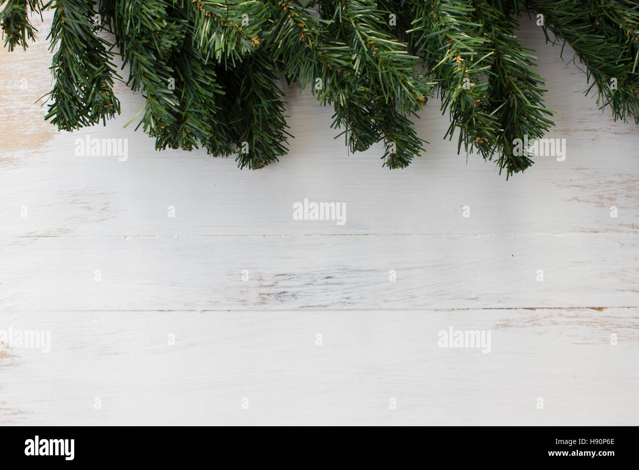 Branch of fir tree,Christmas leaf on wooden floor background Stock ...