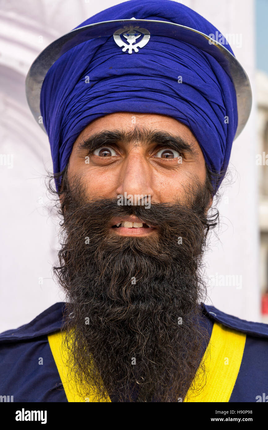 Sikh guard at The Golden Temple Complex in the Sikh city of Amritsar ...