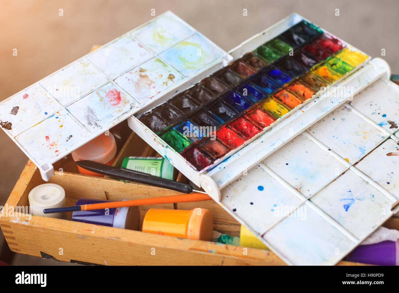 Paints, brushes and other tools in the artist's studio Stock Photo - Alamy