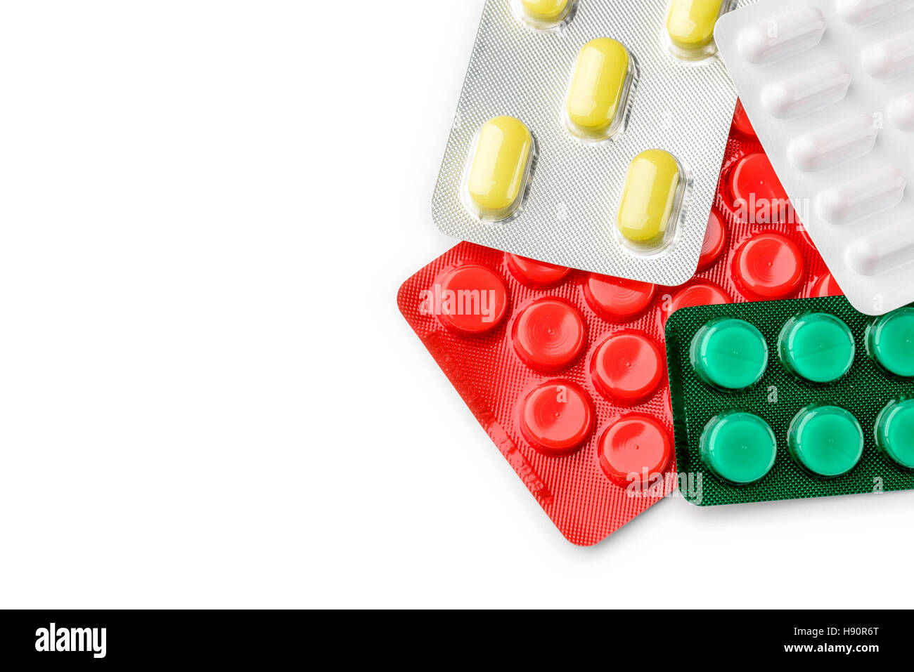 Red, yellow, green and white pills blisters of pharmacy to cure pain ...