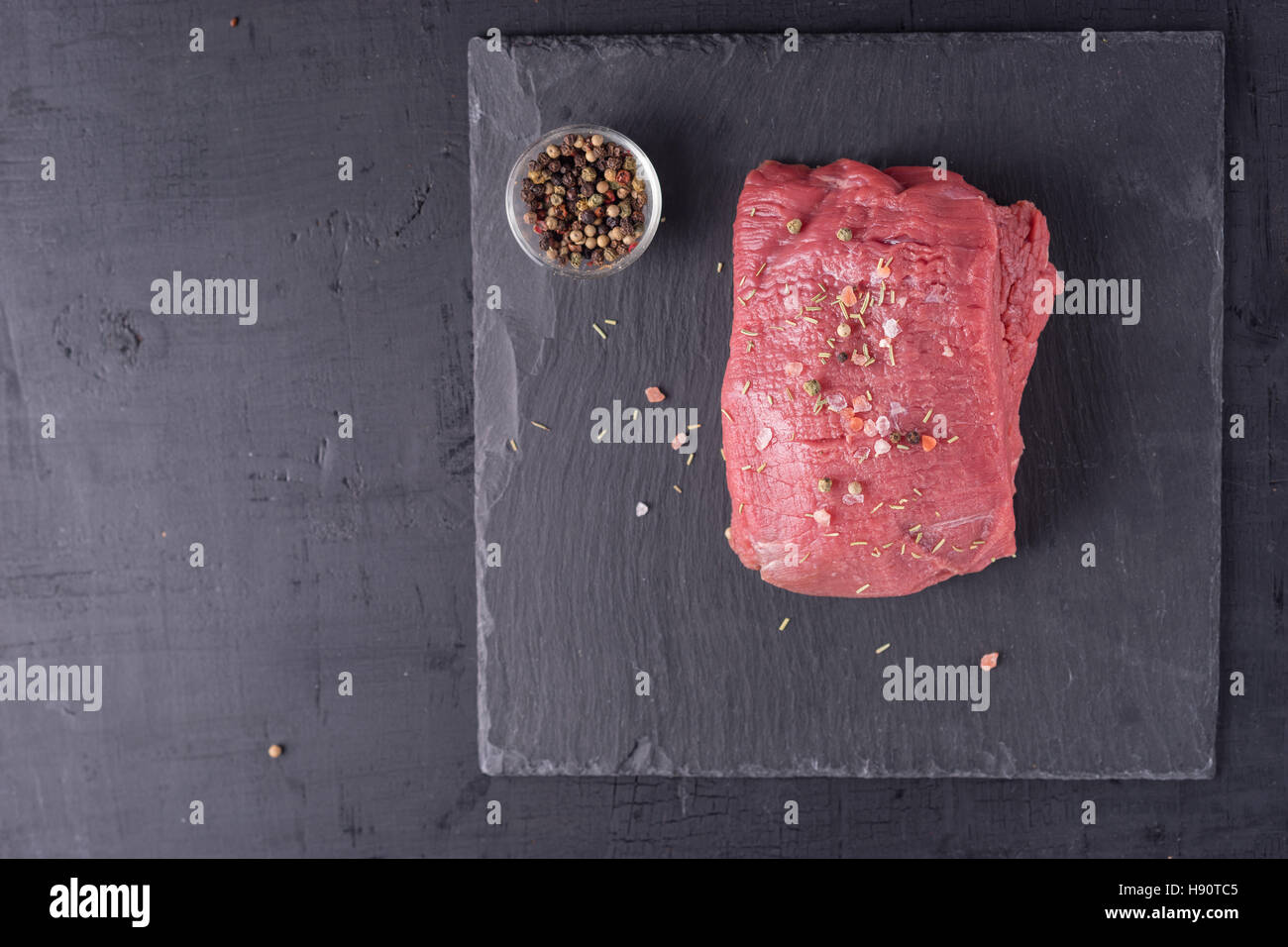 Peace of beef fillet for steak on slate plate Stock Photo - Alamy