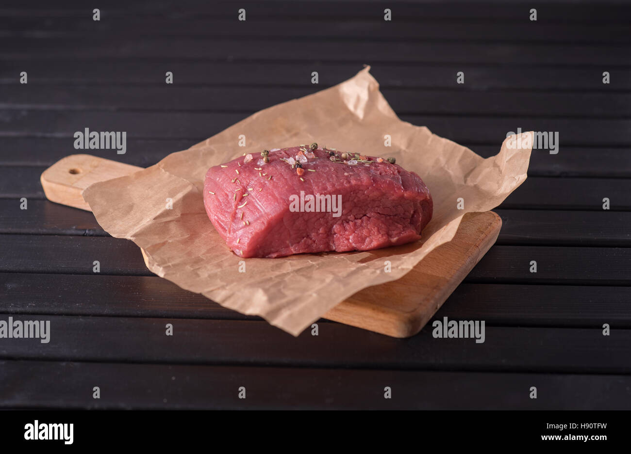 Peace of beef fillet for steak on table Stock Photo - Alamy