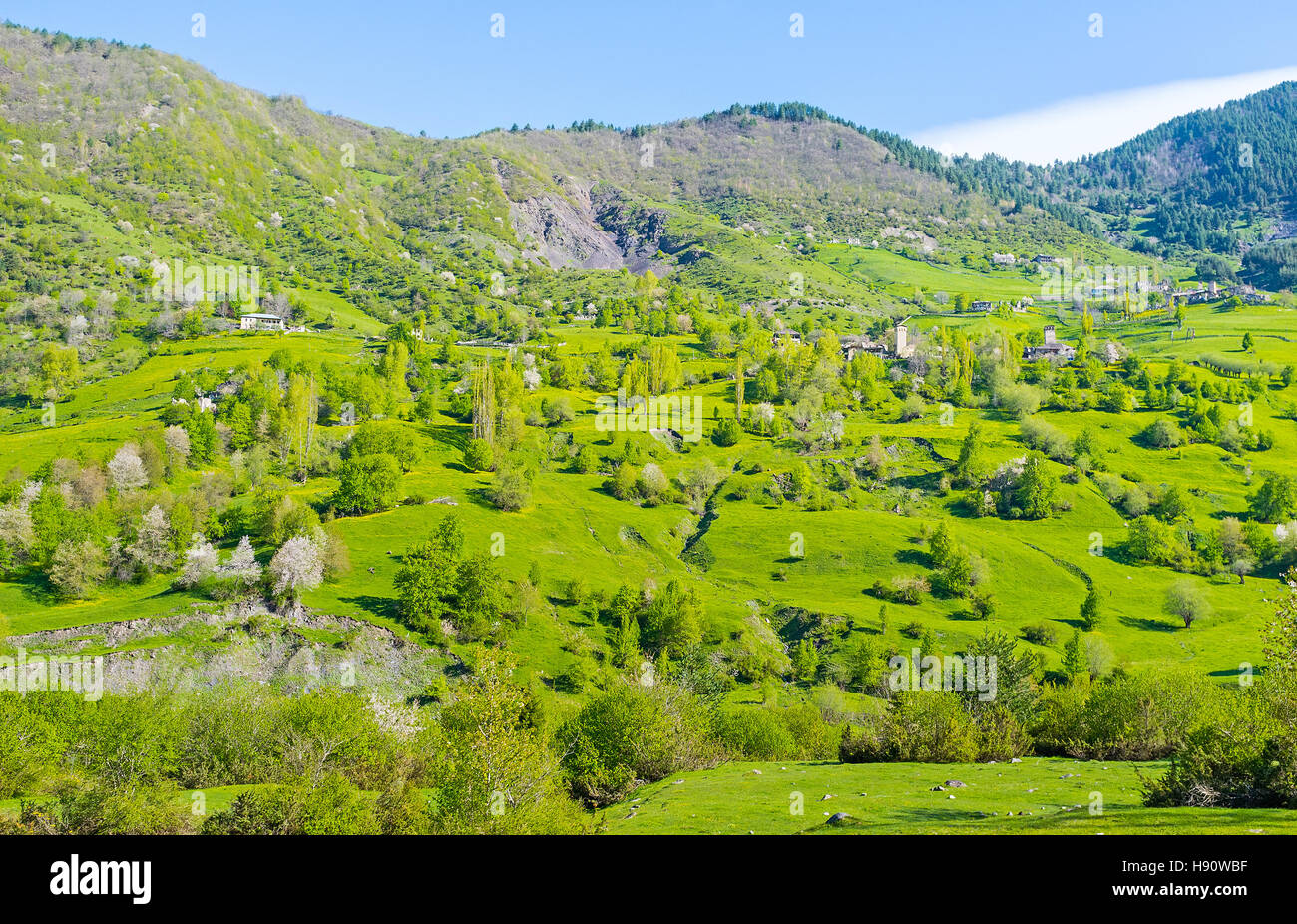 The Caucasus mountain landscape with the scattered houses and medieval ...