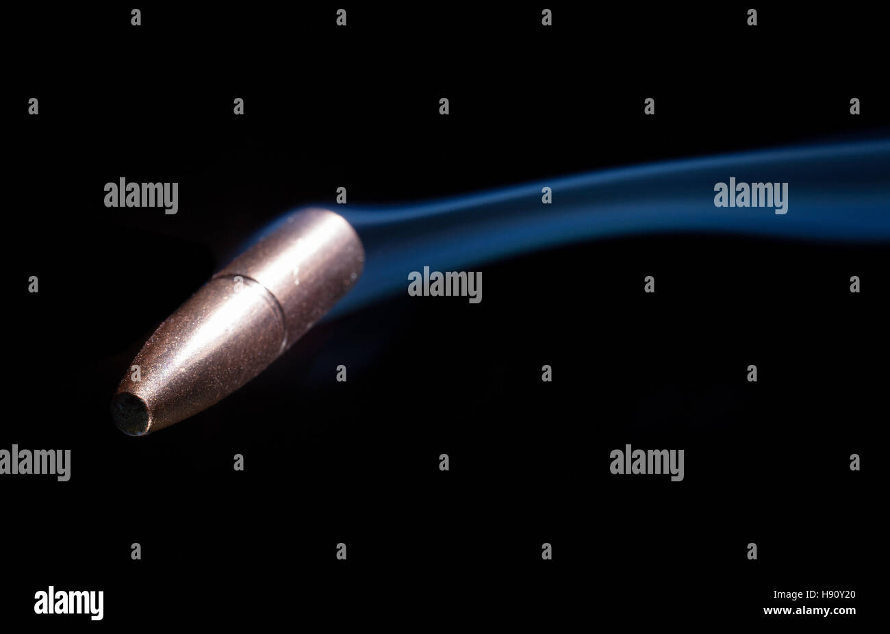 Bullet that has encountered wind and changed direction Stock Photo - Alamy