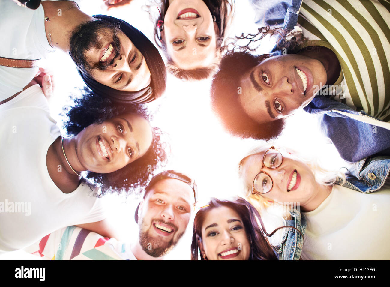 Friends Huddle Join Holiday Party Group Concept Stock Photo - Alamy