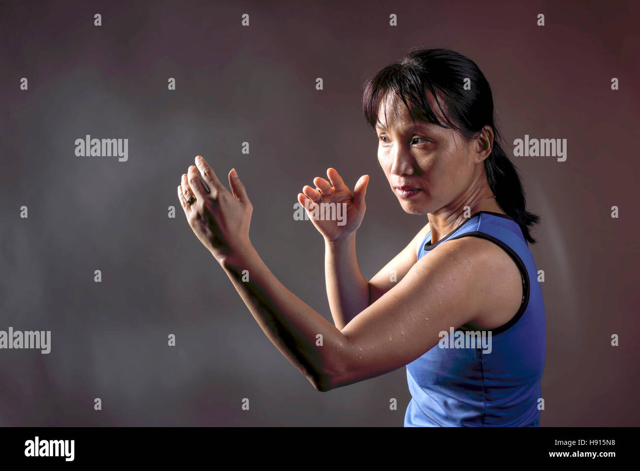 Woman in fight position Stock Photo - Alamy