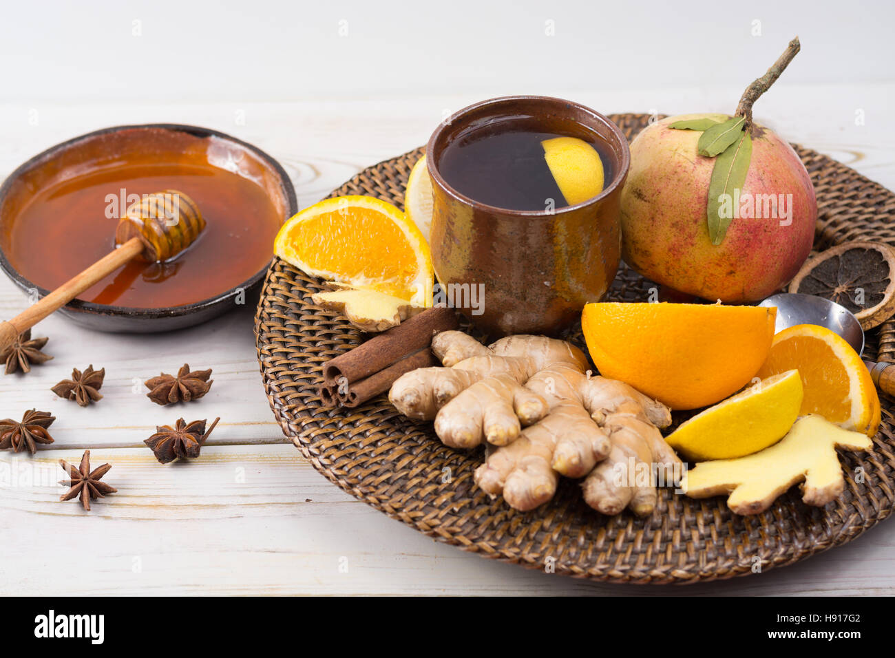 Natural flu and cold remedy - orange and lemon fruit, fresh ginger ...