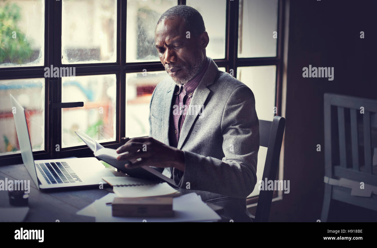Businessman Reading Book Ideas Workplace Concept Stock Photo - Alamy