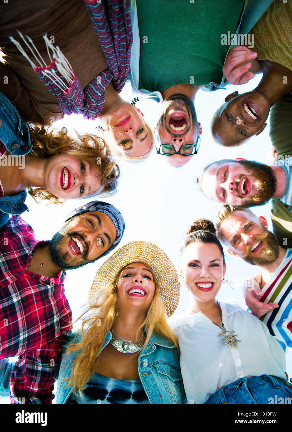 Friends Huddle Join Holiday Party Group Concept Stock Photo - Alamy