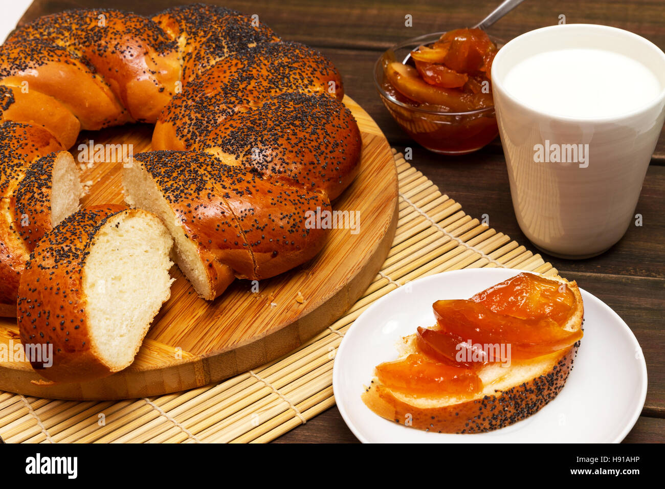 buns with poppy seeds and homemade apple jam Stock Photo - Alamy