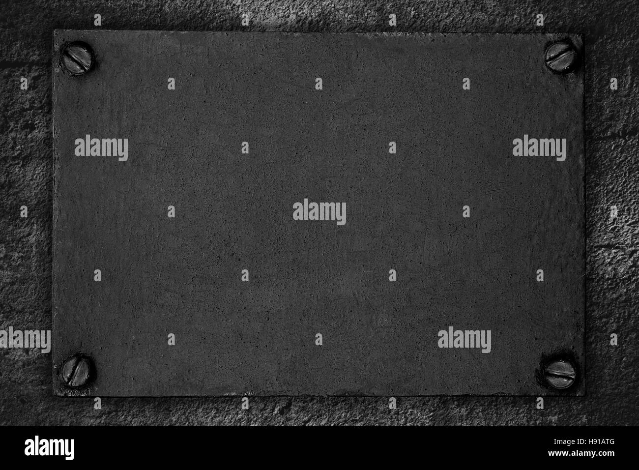 black steel plate with screws or abstract rough background Stock Photo ...
