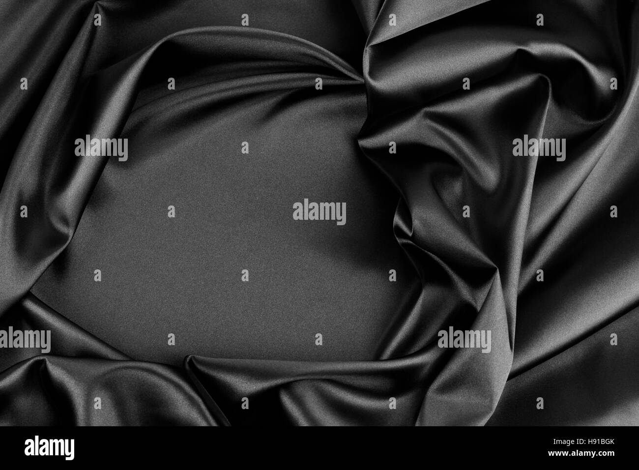 Closeup of rippled black silk fabric Stock Photo - Alamy