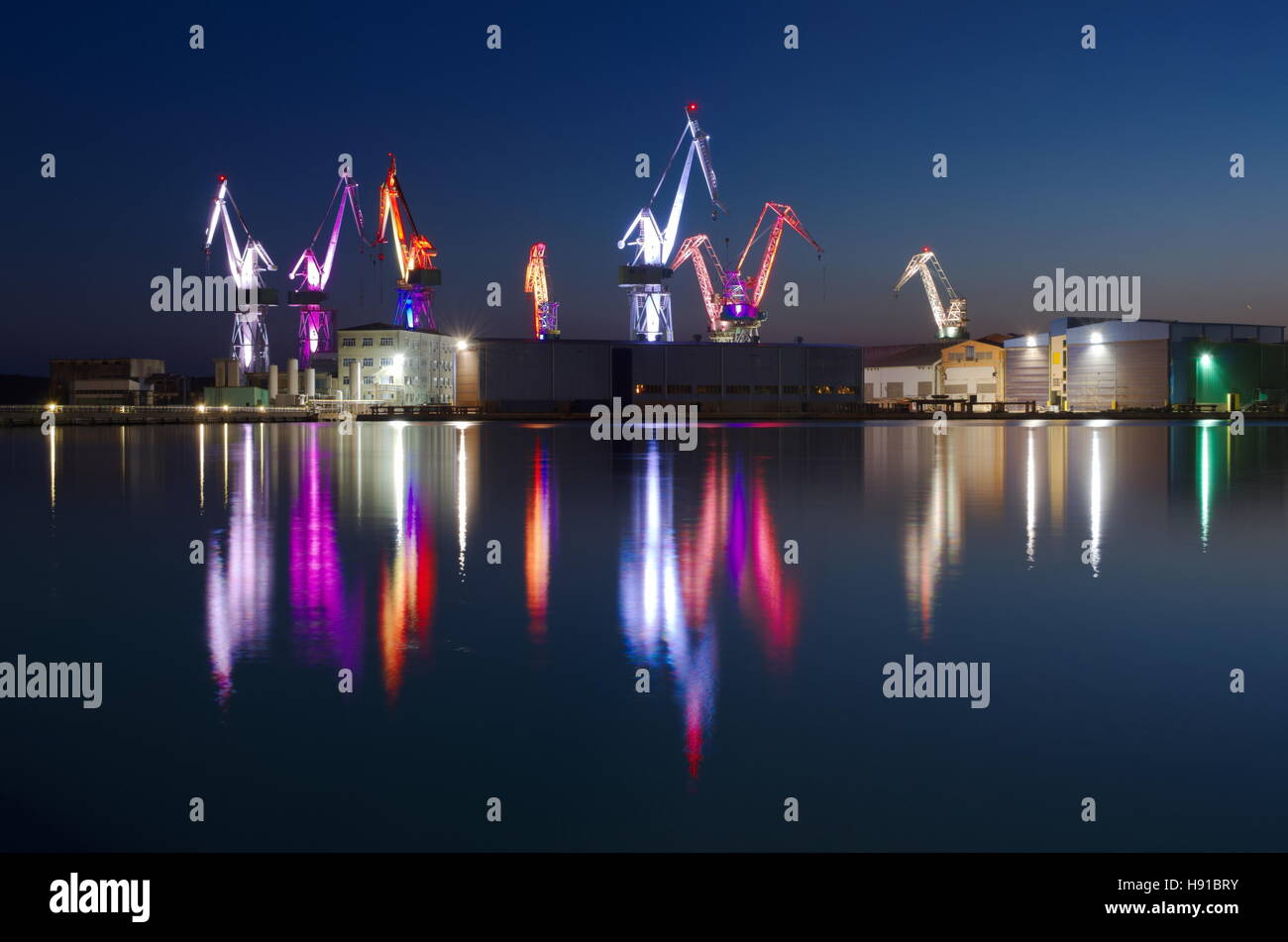 Colorfully Lit Dock Cranes in Pula Croatia at Night Stock Photo - Alamy
