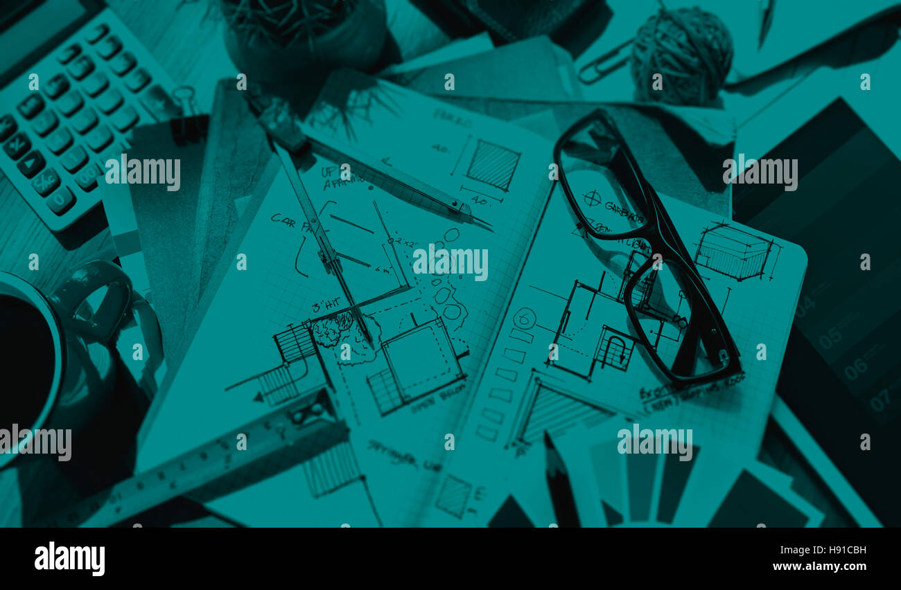 Messy Designer's Table with Sketch and Tools Stock Photo - Alamy