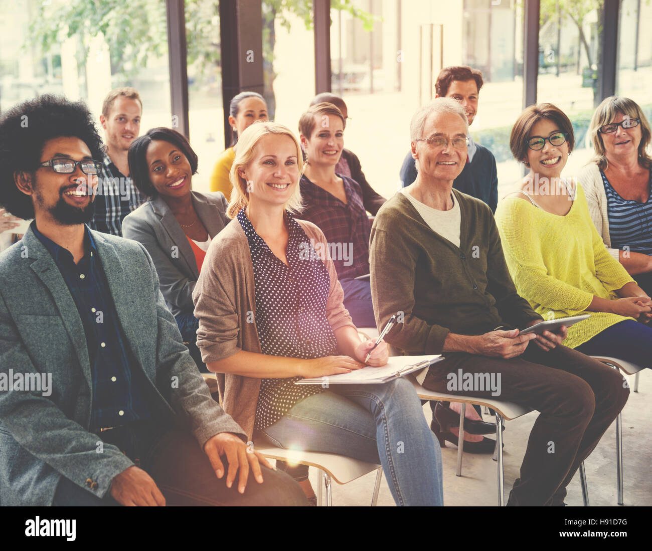 Multi-Ethnic Group of People in Seminar Concept Stock Photo - Alamy