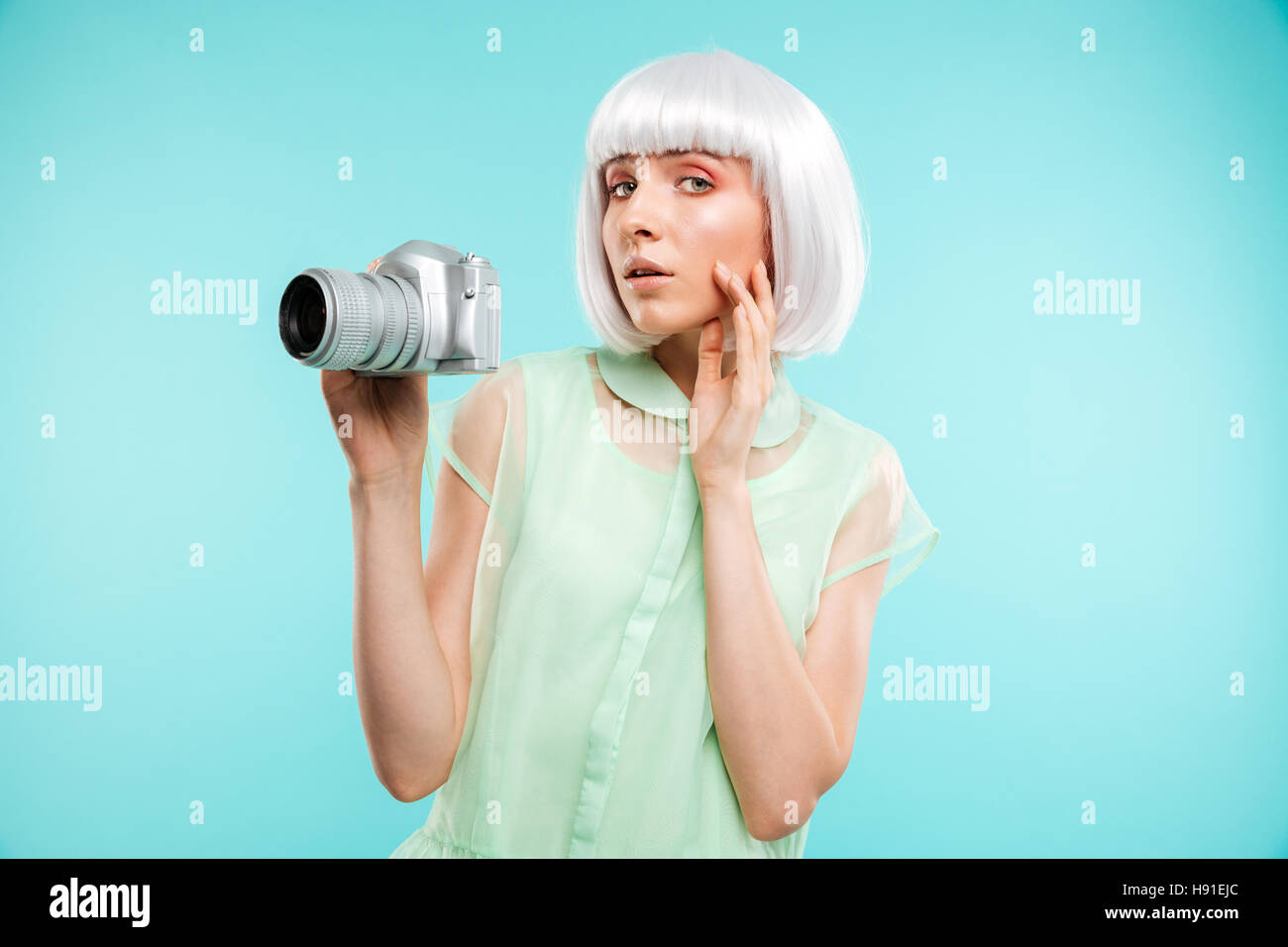 Portrait of woman fashion photographer with modern photo camera Stock ...