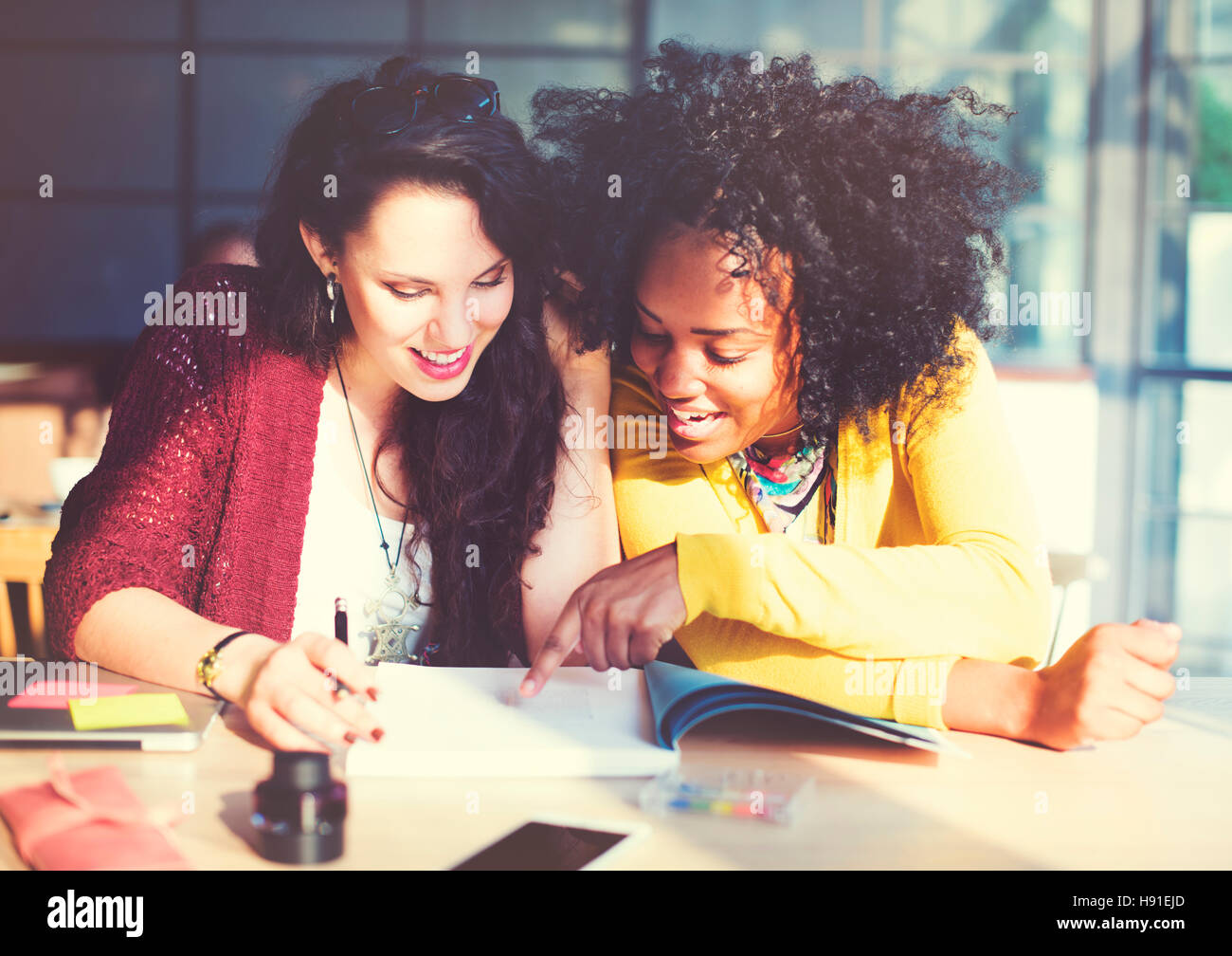 Ladies Women Working Together Project Concept Stock Photo - Alamy