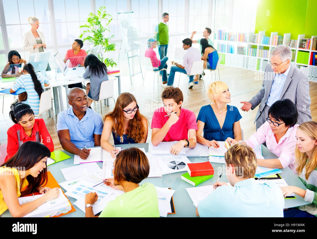 Group of Student in the Classroom Discussion Concept Stock Photo - Alamy
