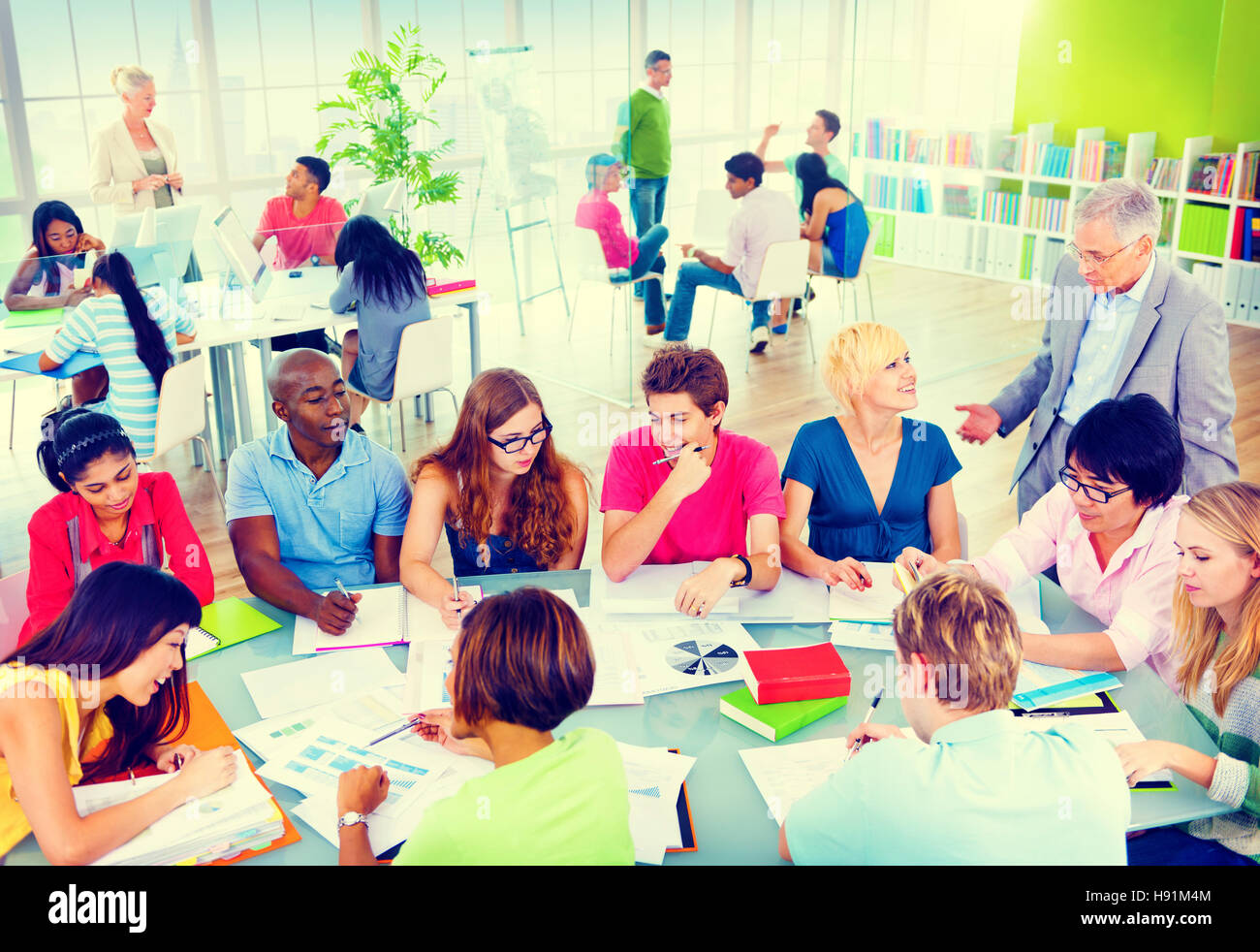 Group of Student in the Classroom Discussion Concept Stock Photo - Alamy