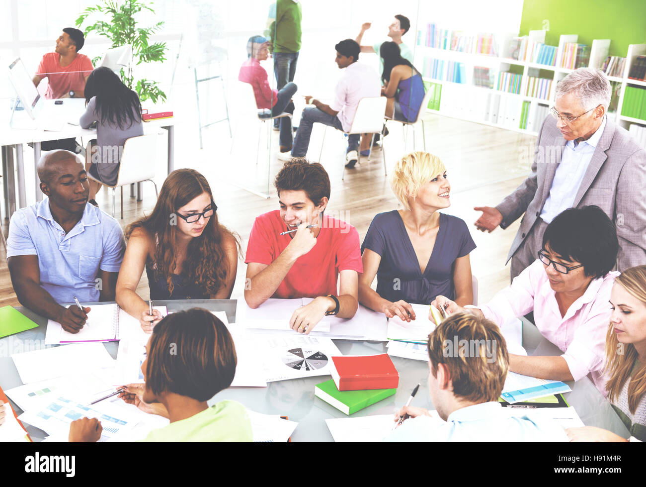 Group of Student in the Classroom Discussion Concept Stock Photo - Alamy