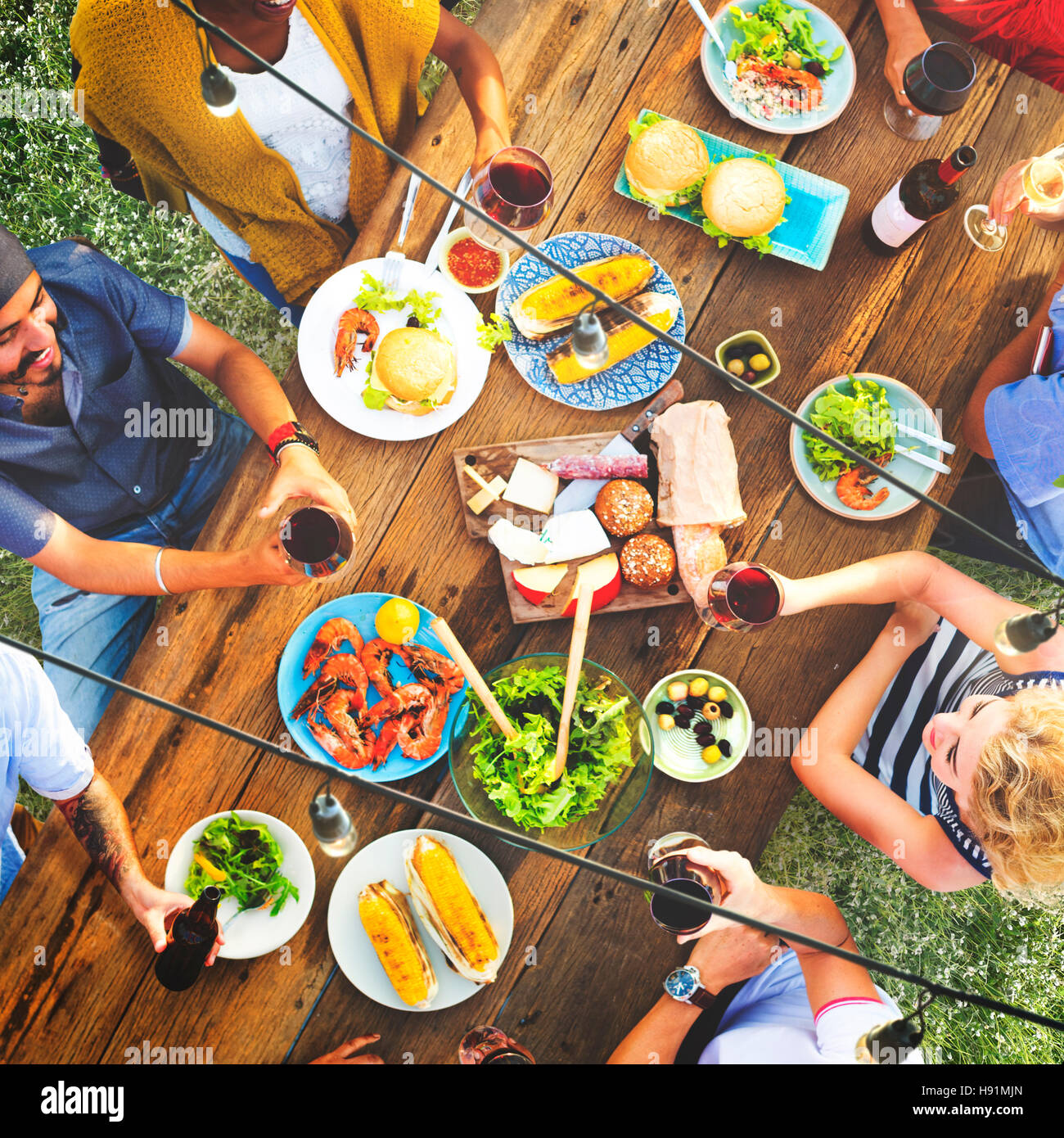 Friends Friendship Outdoor Dining Hanging out Concept Stock Photo - Alamy