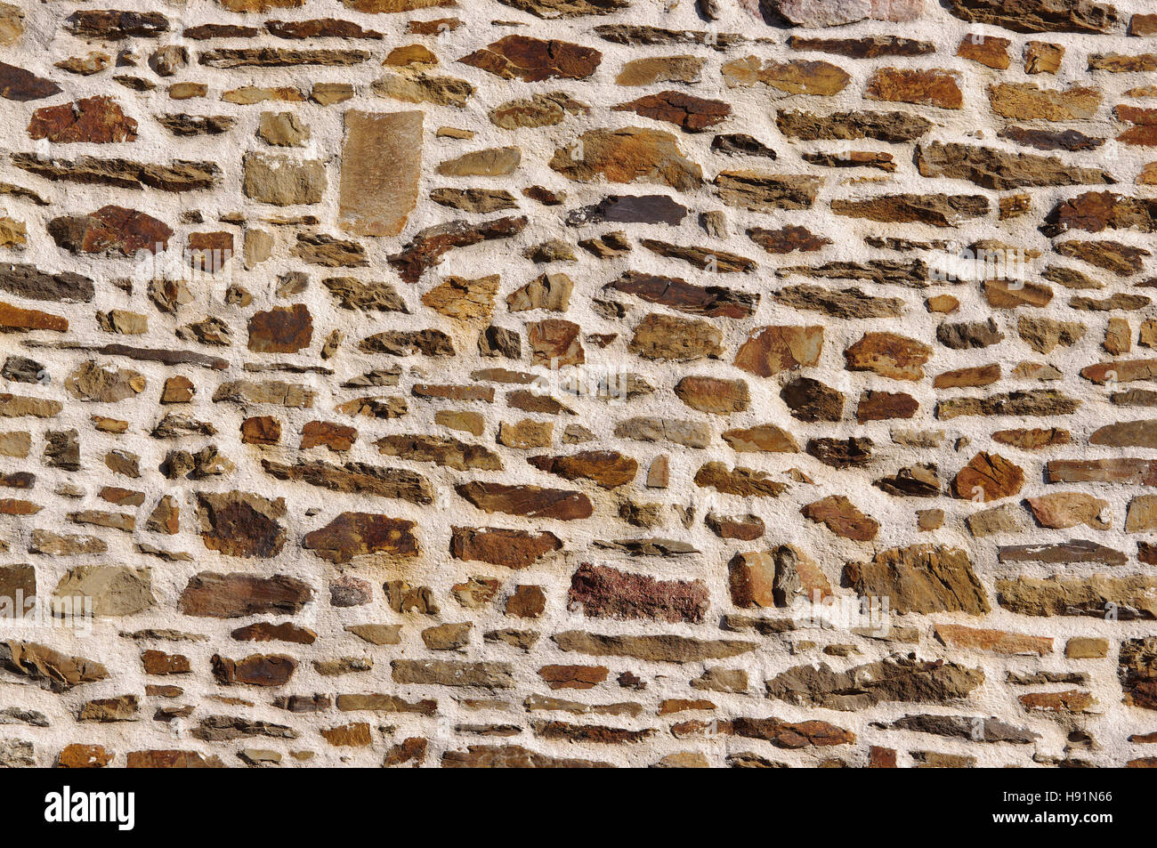 textured wall of stone and cement Stock Photo - Alamy