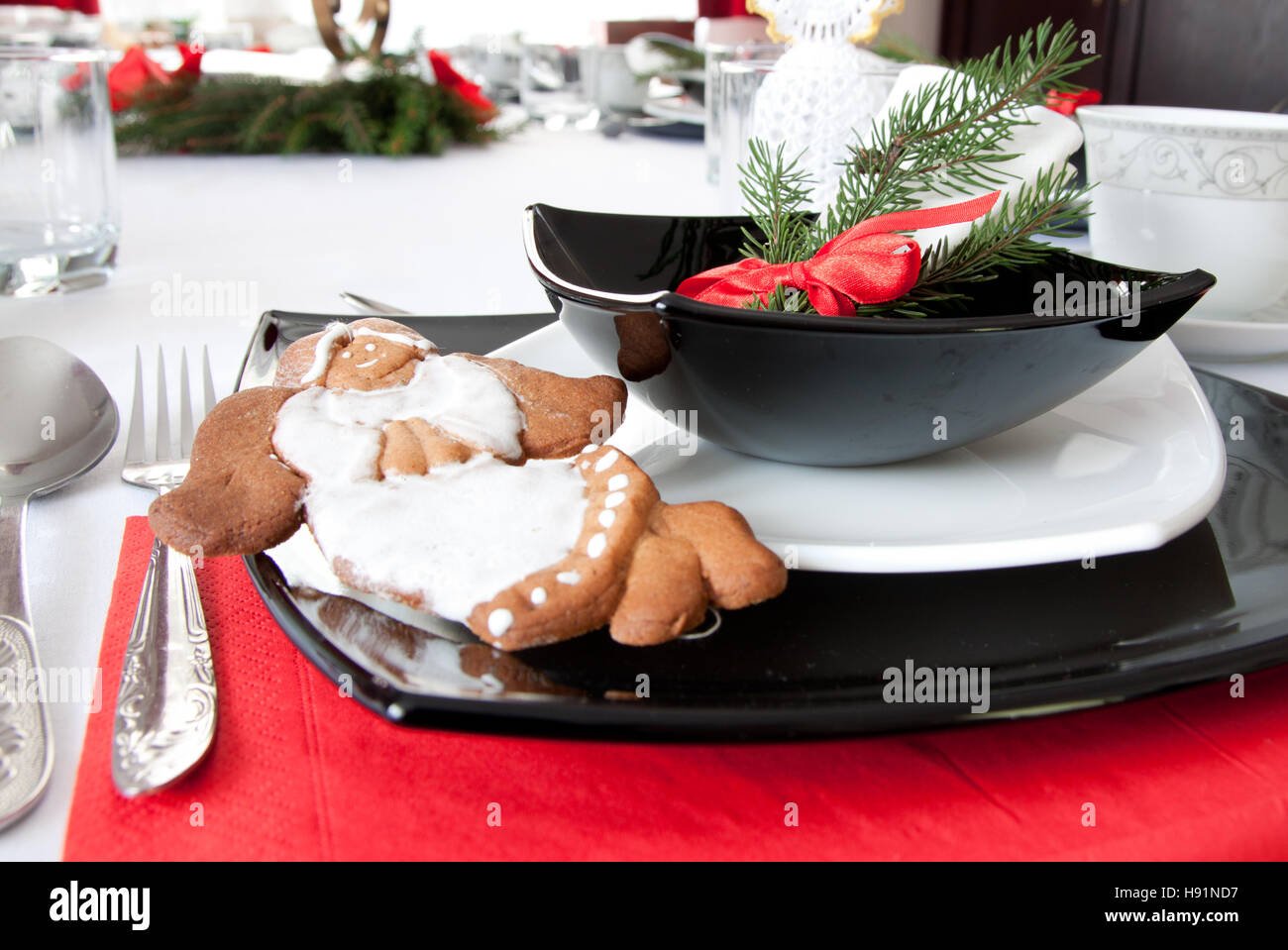 empty table setting with sweet angel at restaurant waiting for dinner ...