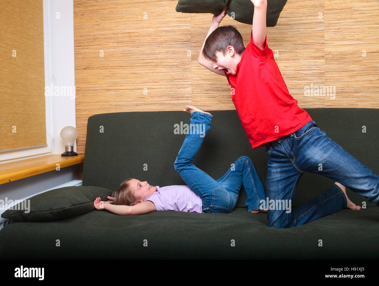 Brother sister play fighting on hi-res stock photography and images - Alamy
