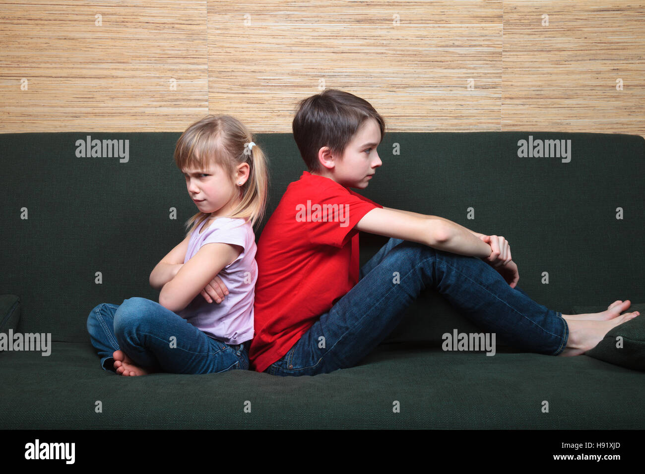 Two siblings sad hi-res stock photography and images - Alamy