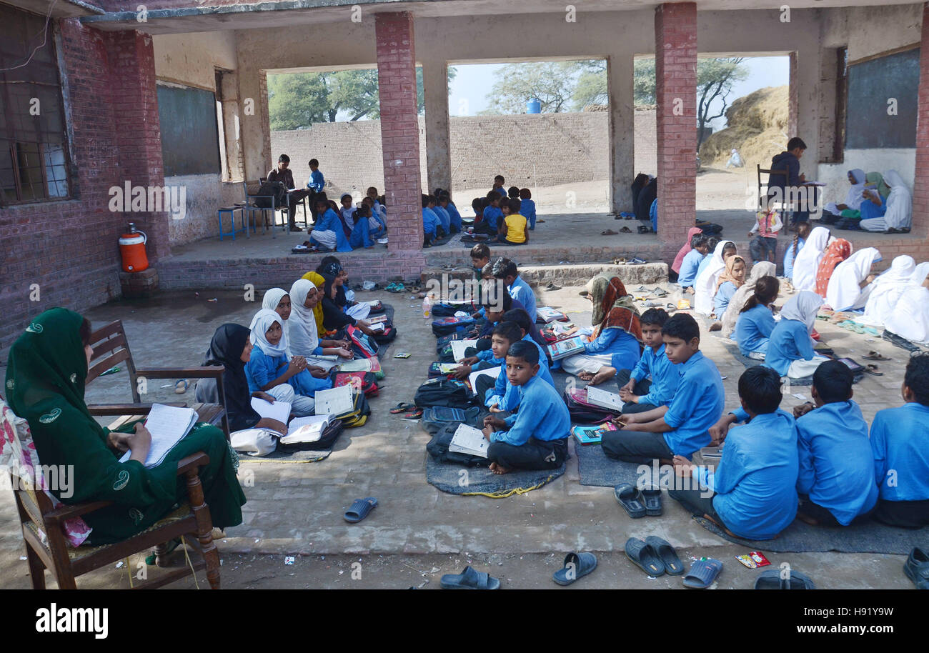 Pakistani students seen studying at the subrub of Lahore as people ...