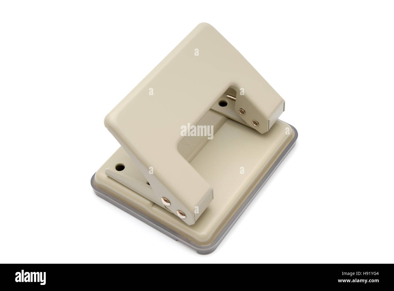 Small office puncher on a white background Stock Photo - Alamy