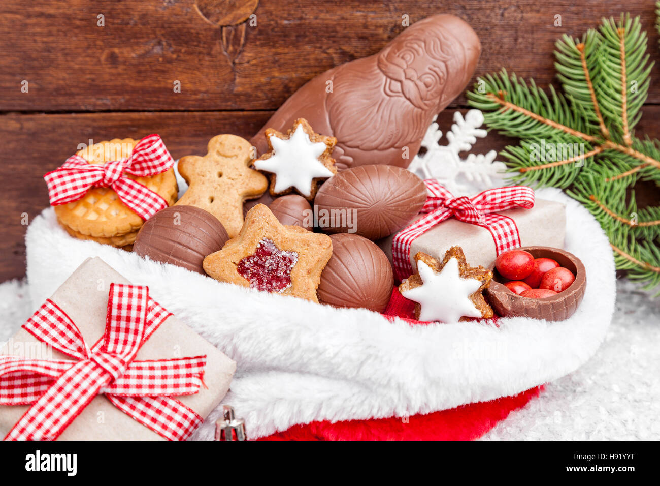 Festive Christmas wooden background with sweets and decoration Stock ...