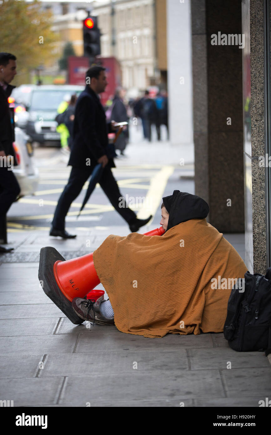 Homeless man begging on the streets of London speaking through a ...