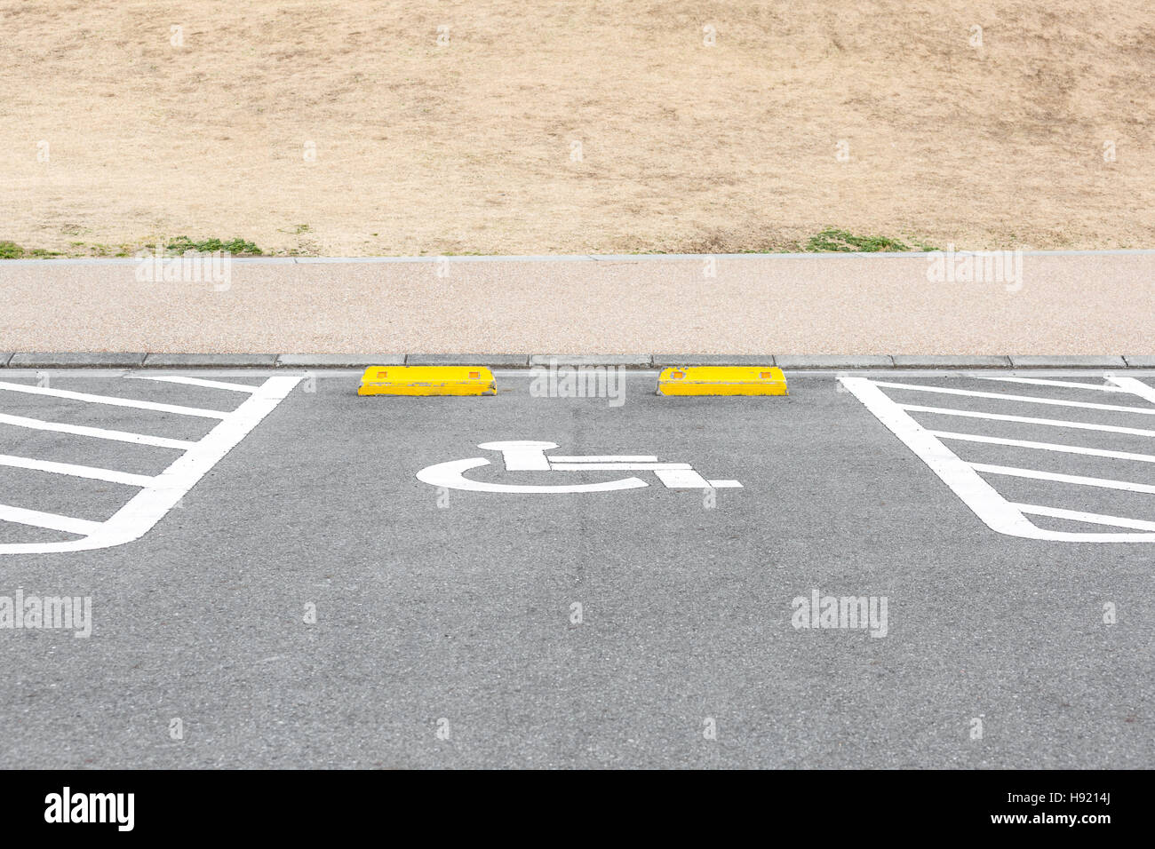 Handicapped Parking Spaces in commercial parking lot Stock Photo - Alamy