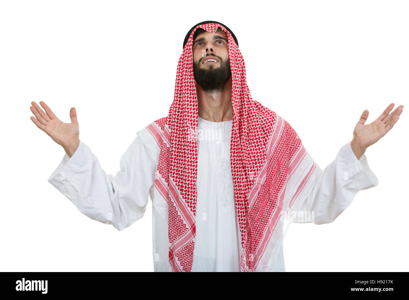 Arab man praying on white hi-res stock photography and images - Alamy