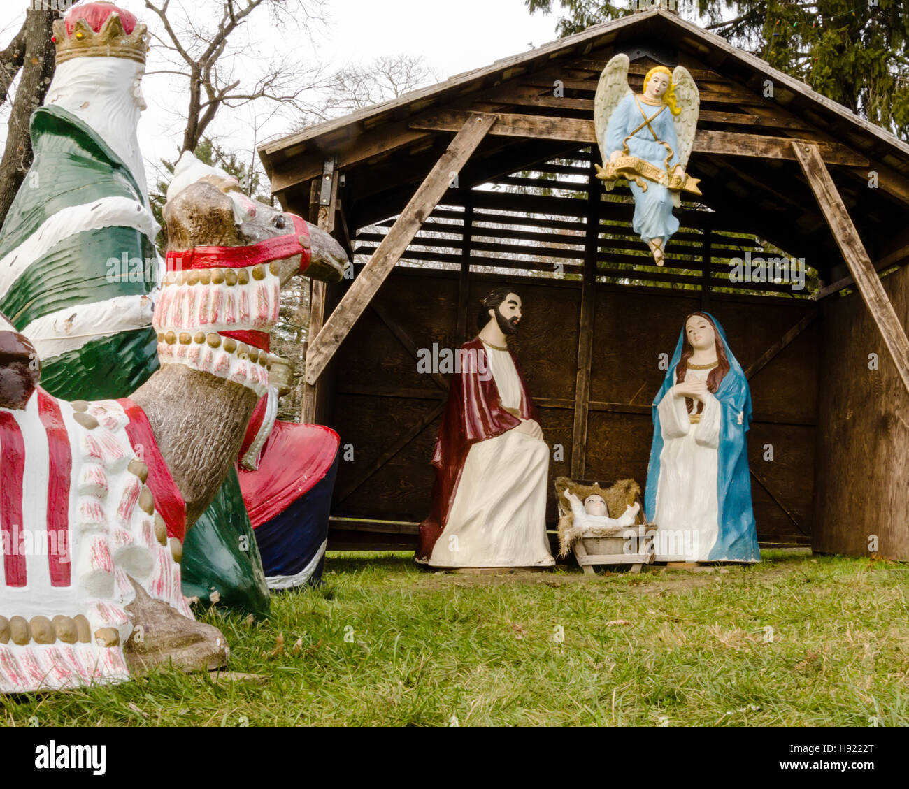 Christmas display of Holy family in traditional outdoor nativity ...