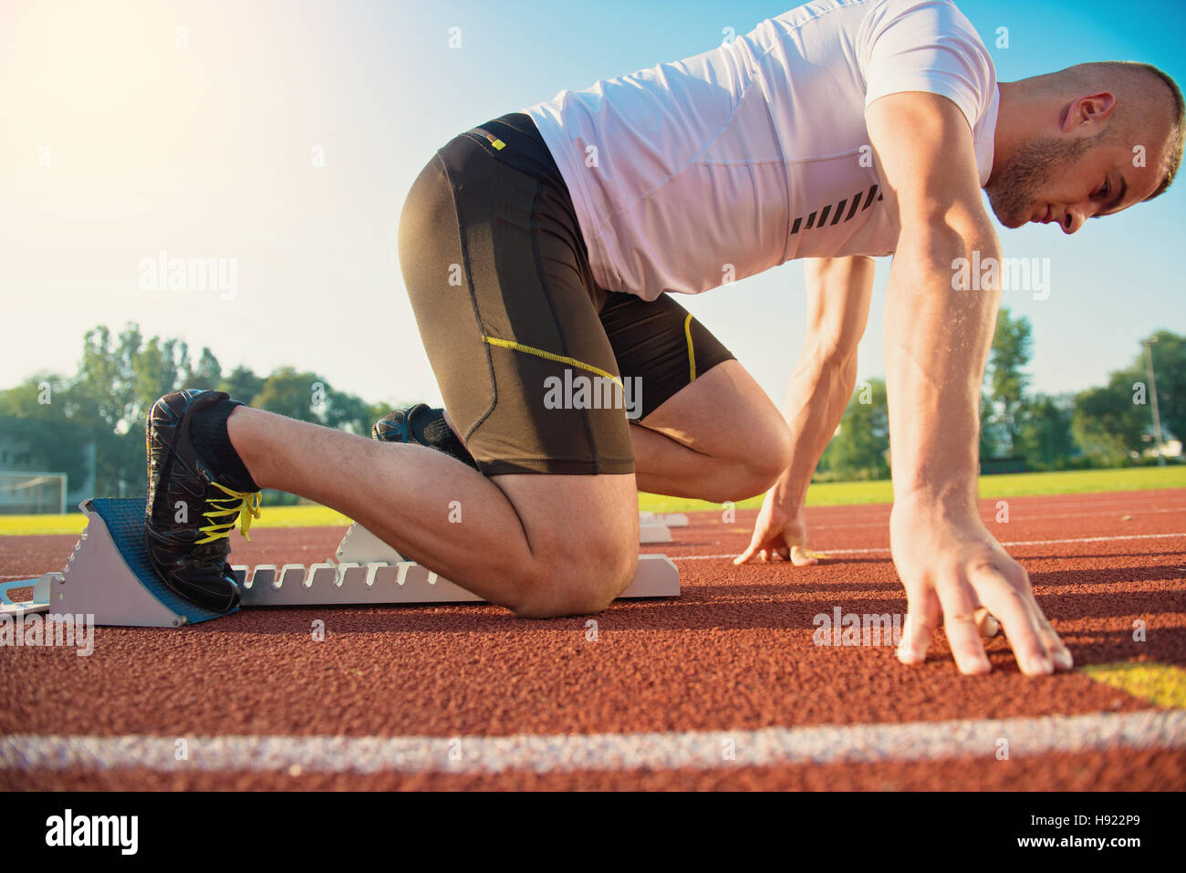 Close-up of sprinter feet in starting block Stock Photo - Alamy