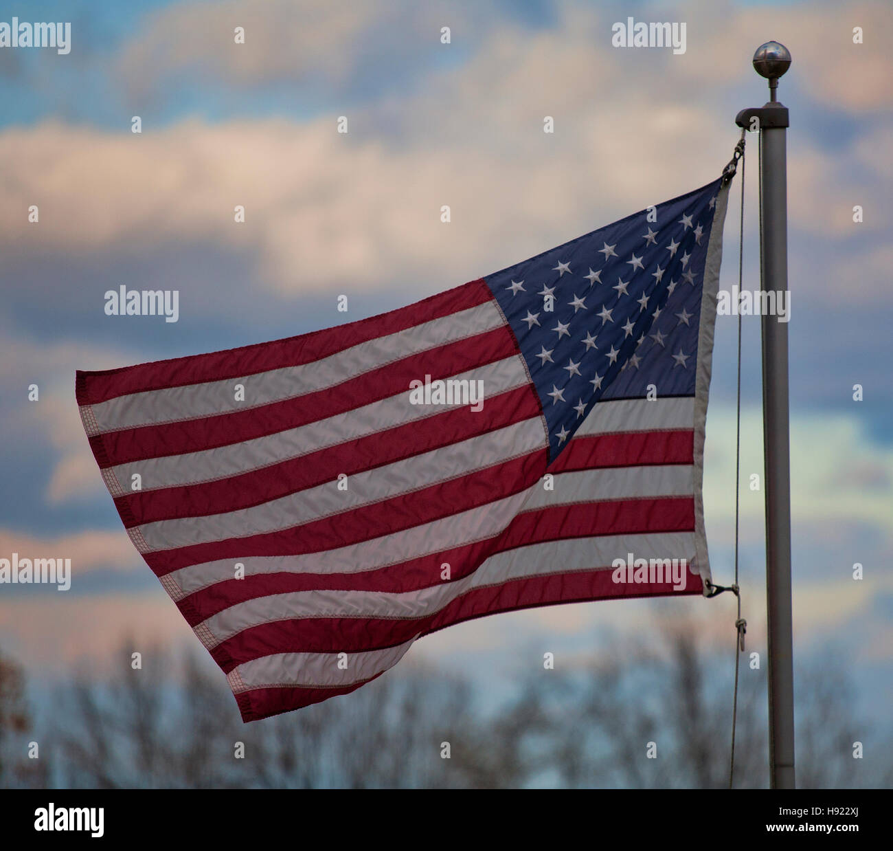 American flag in a breeze atop a ridge overlooking the Shenandoah ...